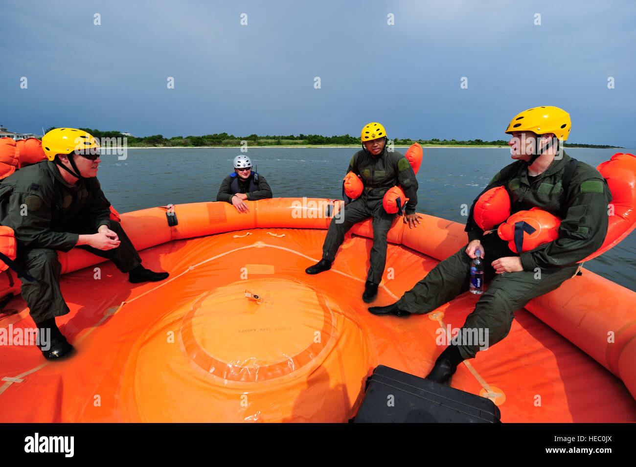 U.S. Airmen with the 305th Air Mobility Wing sit in a raft while ...