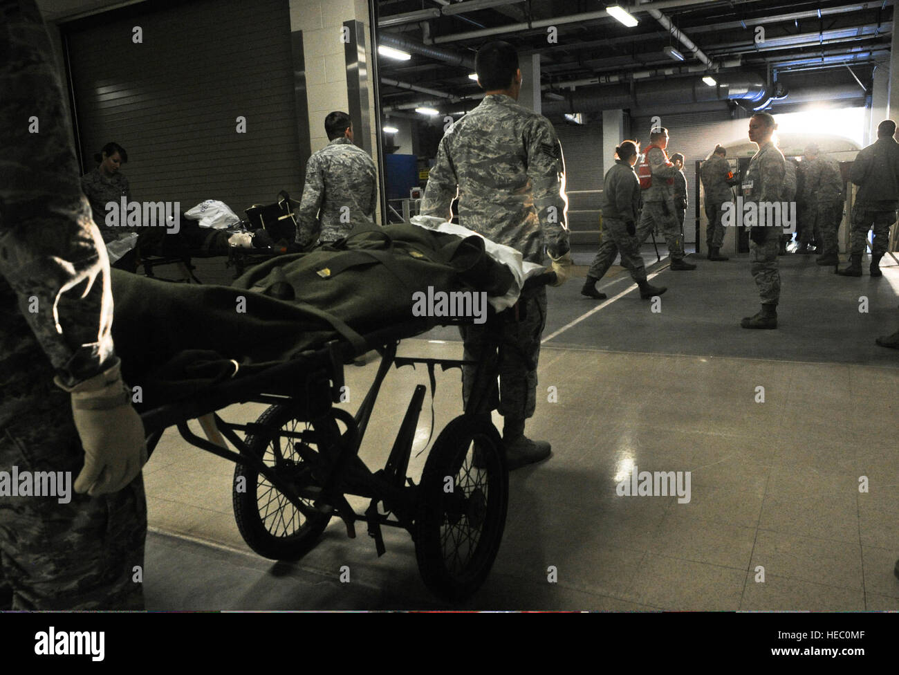 U.S. Airmen with the 673rd Medical Group prepare simulated natural ...