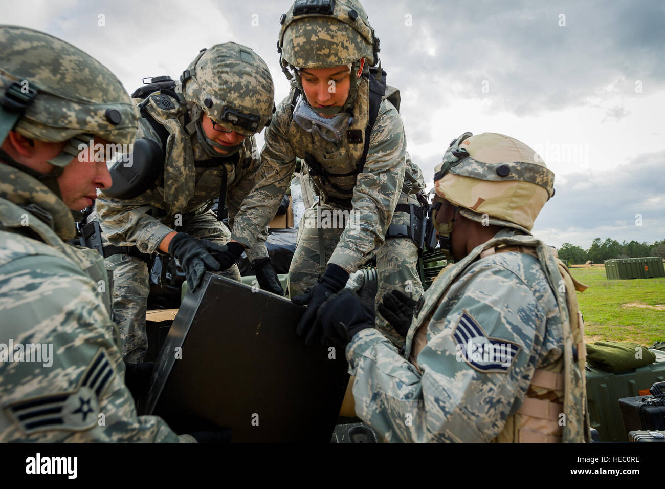 U.S. Air Force aeromedical evacuation team members unload their ...