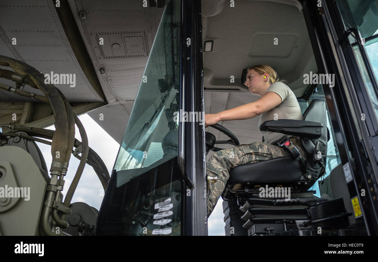 Air Force personnel load cargo onto a C-130J Super Hercules at Ramstein ...