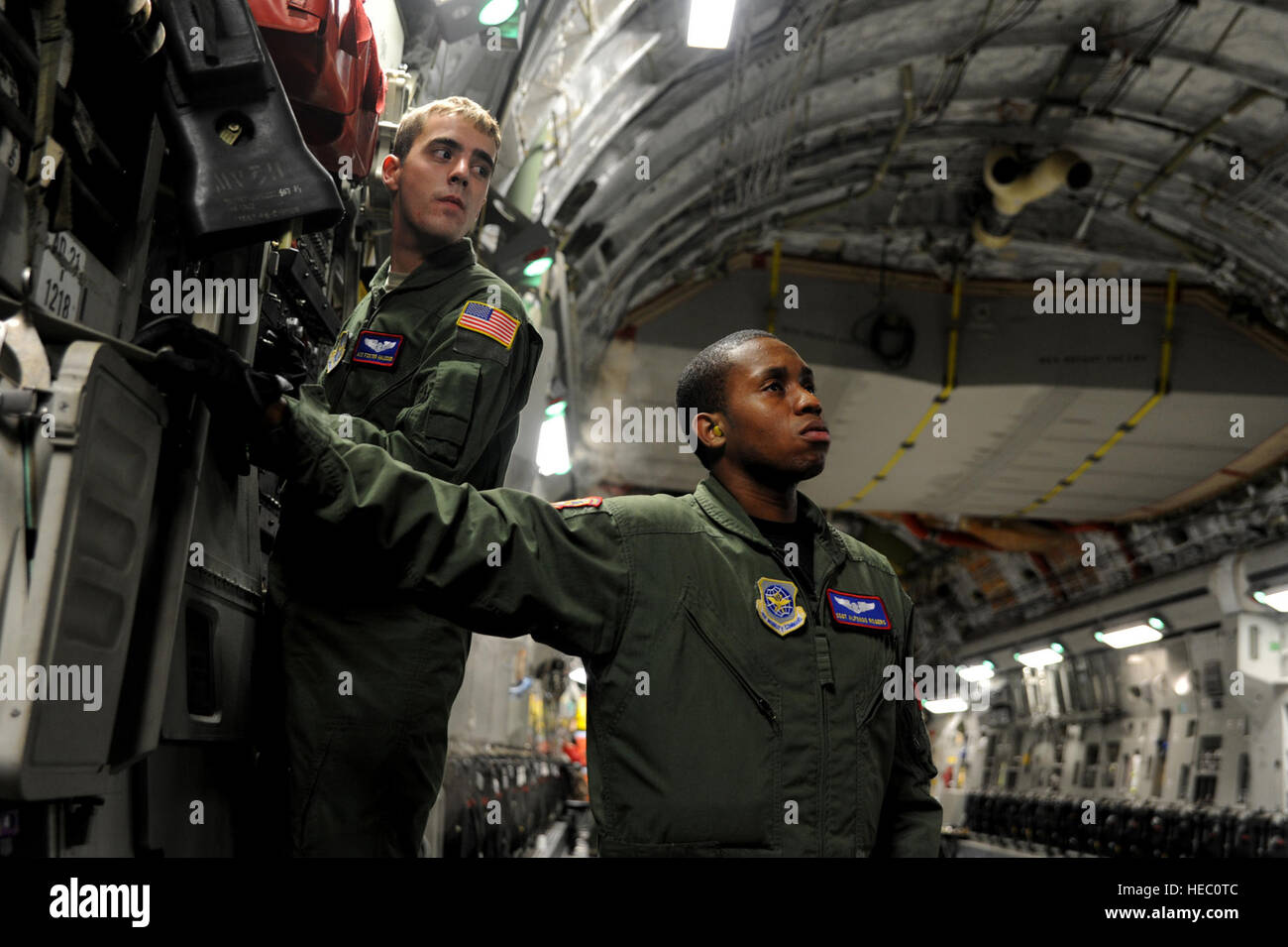 U.S. Air Force Airman 1st Class Foster Halcomb and Staff Sgt. Alfonso ...