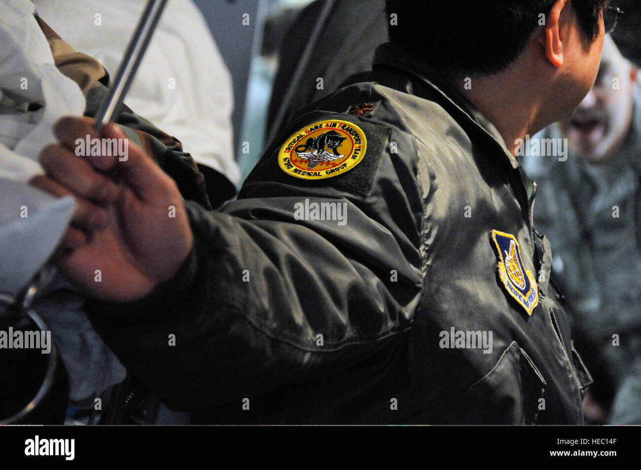 U.S. Air Force Maj. Janice Pecua, with the 673rd Medical Group, turns ...