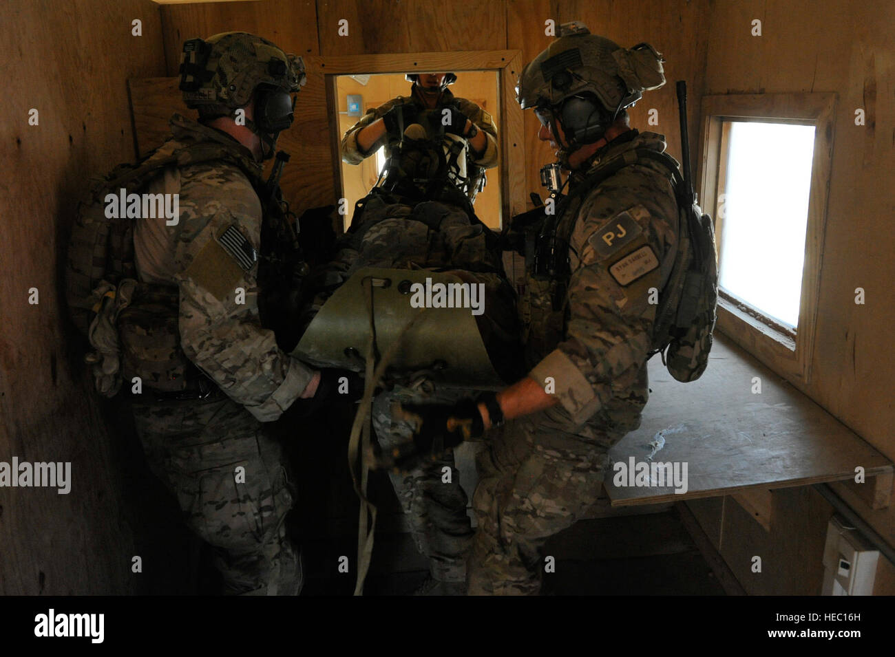 U.S. Air Force Master Sgt. Ryan Darnell, right, a pararescue team ...