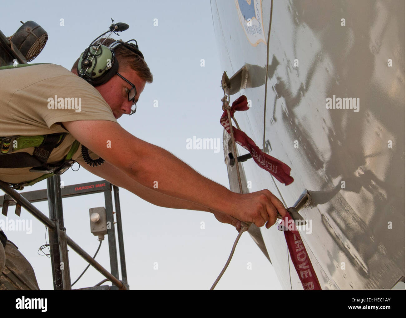 A U.S. Air Force fuels technician installs a pitot static probe cover ...