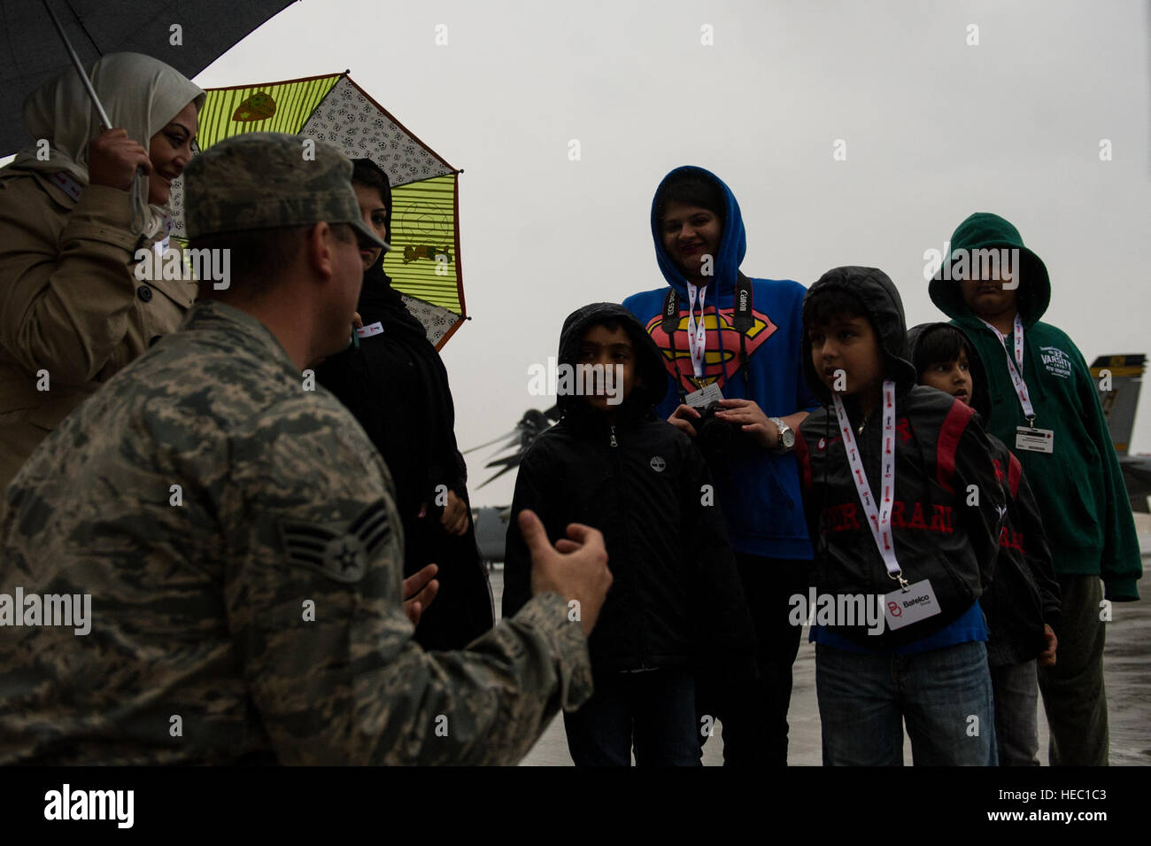 U.S. Air Force Senior Airman Nick Dryden, front left, an electrical and ...
