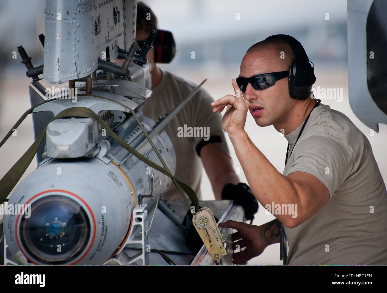 U.S. Air Force Staff Sgt. Chris Martinez, right, with the 355th ...