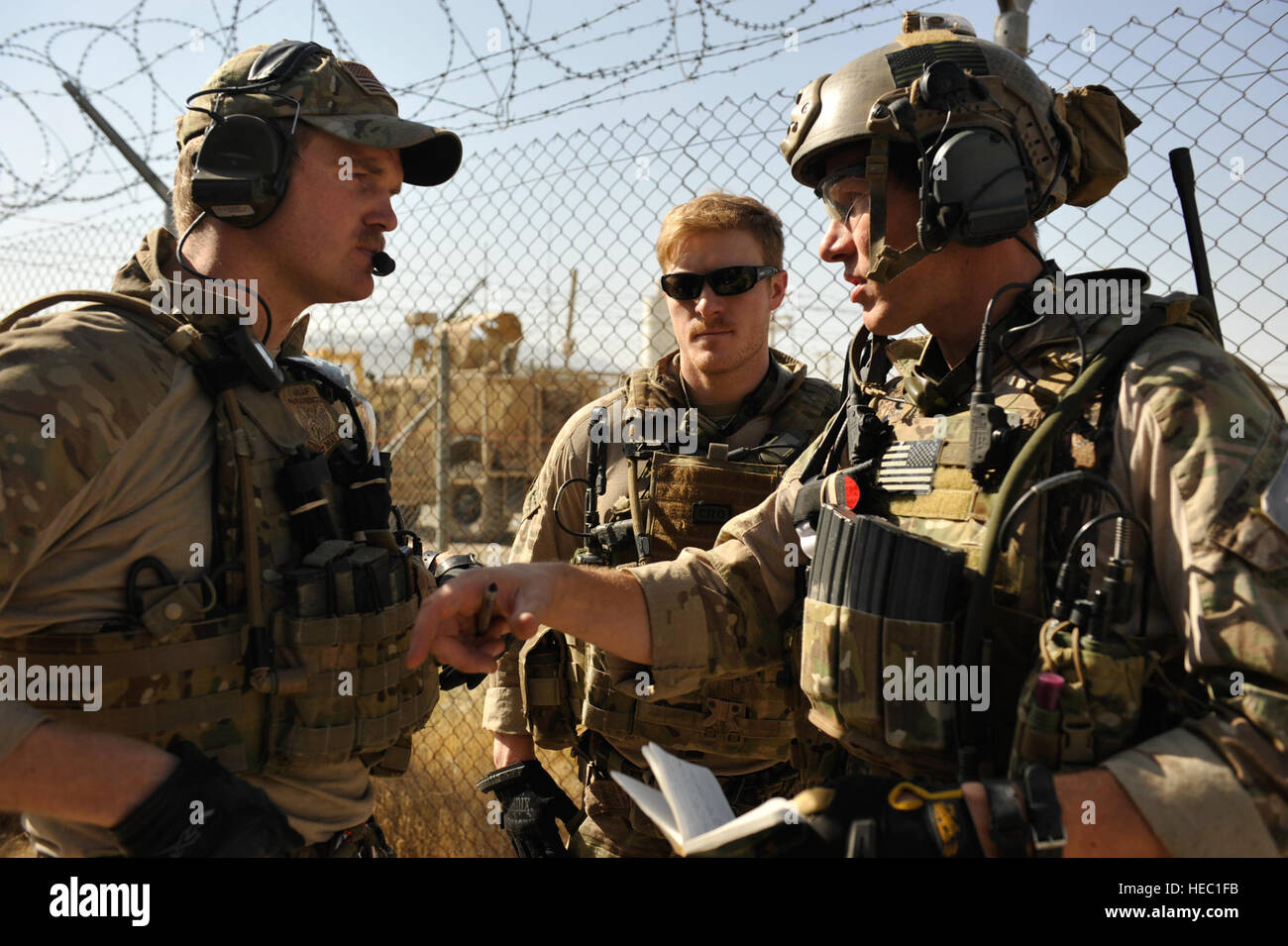 U.S. Air Force Staff Sgt. Jake Racicot, left, Capt. Cameron Rochelle ...