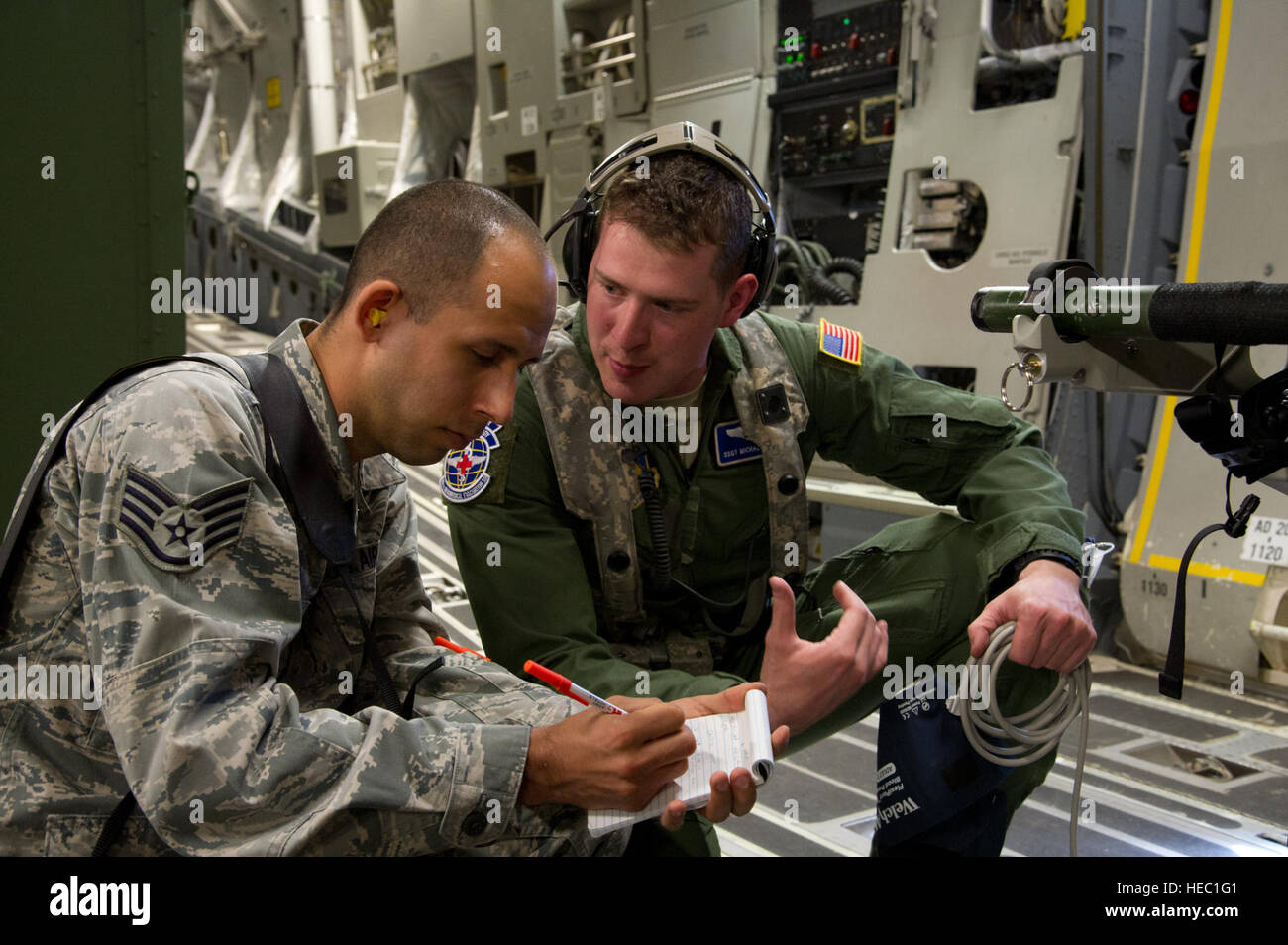 U.S. Air Force Staff Sgt. Joseph Araiza, left, a photojournalist with ...