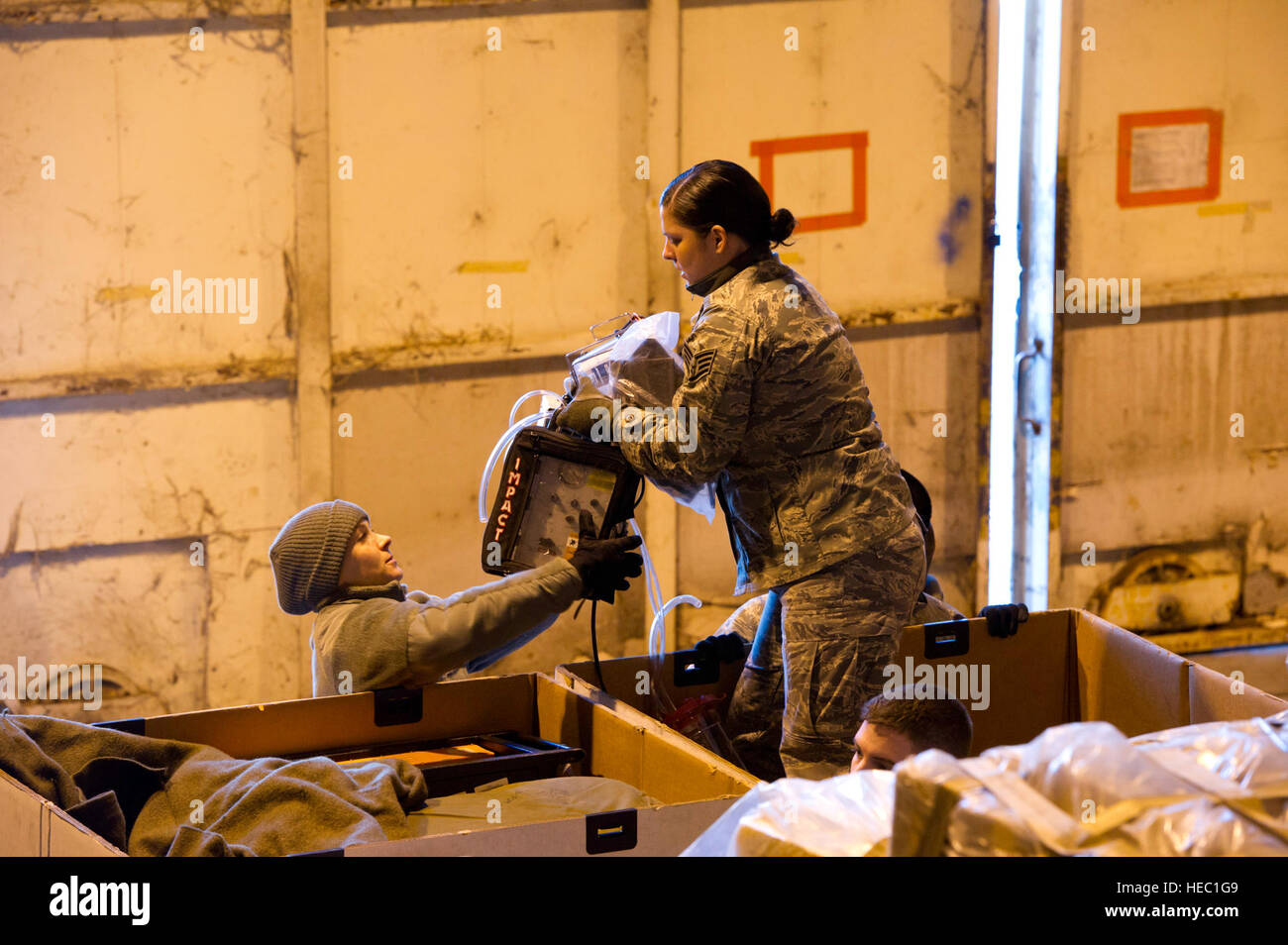U.S. Air Force Staff Sgt. Lauren O'Neal, right, a flight medic assigned ...