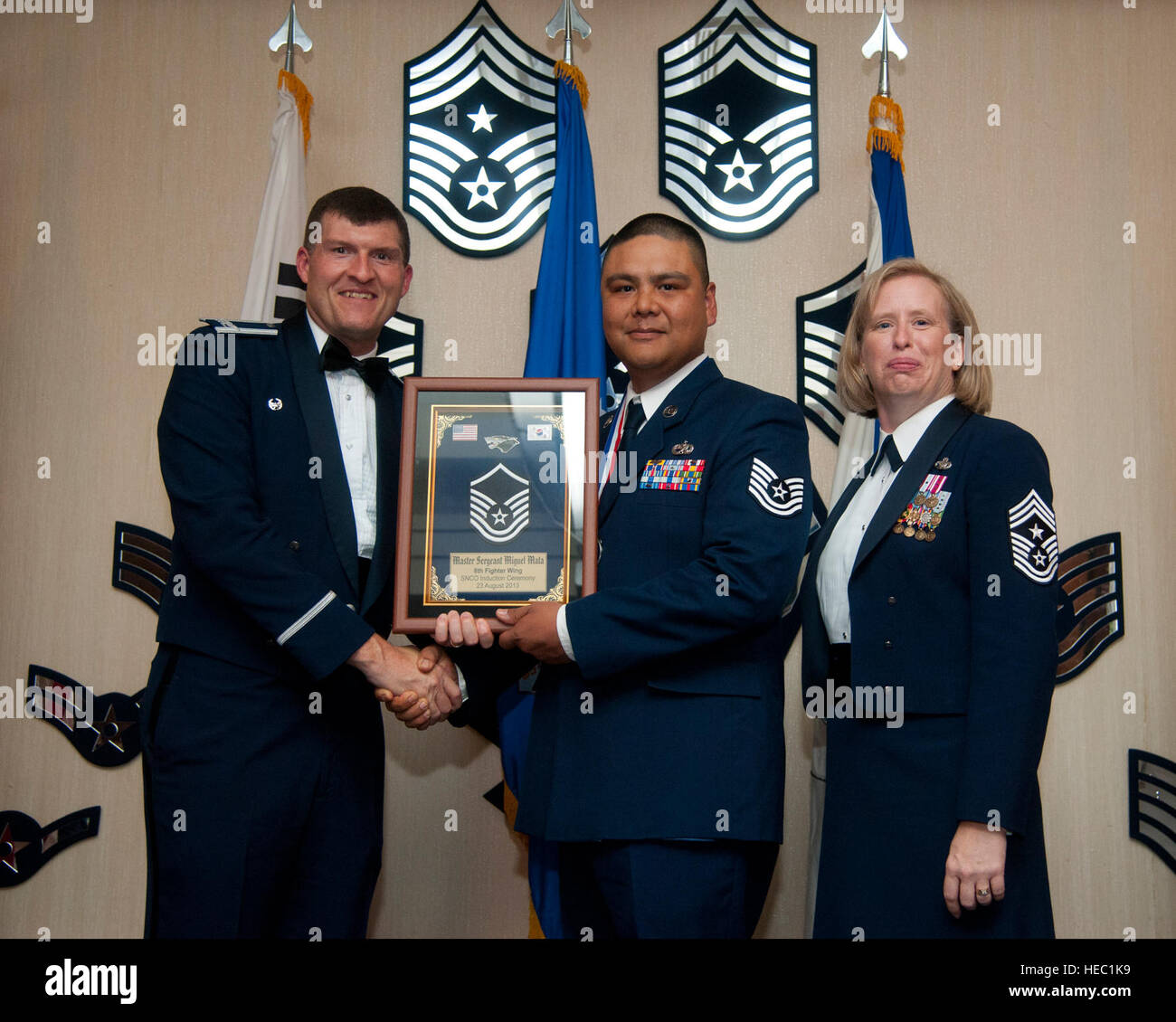 U.S. Air Force Tech. Sgt. Miguel Mata, center, assigned to the 8th ...