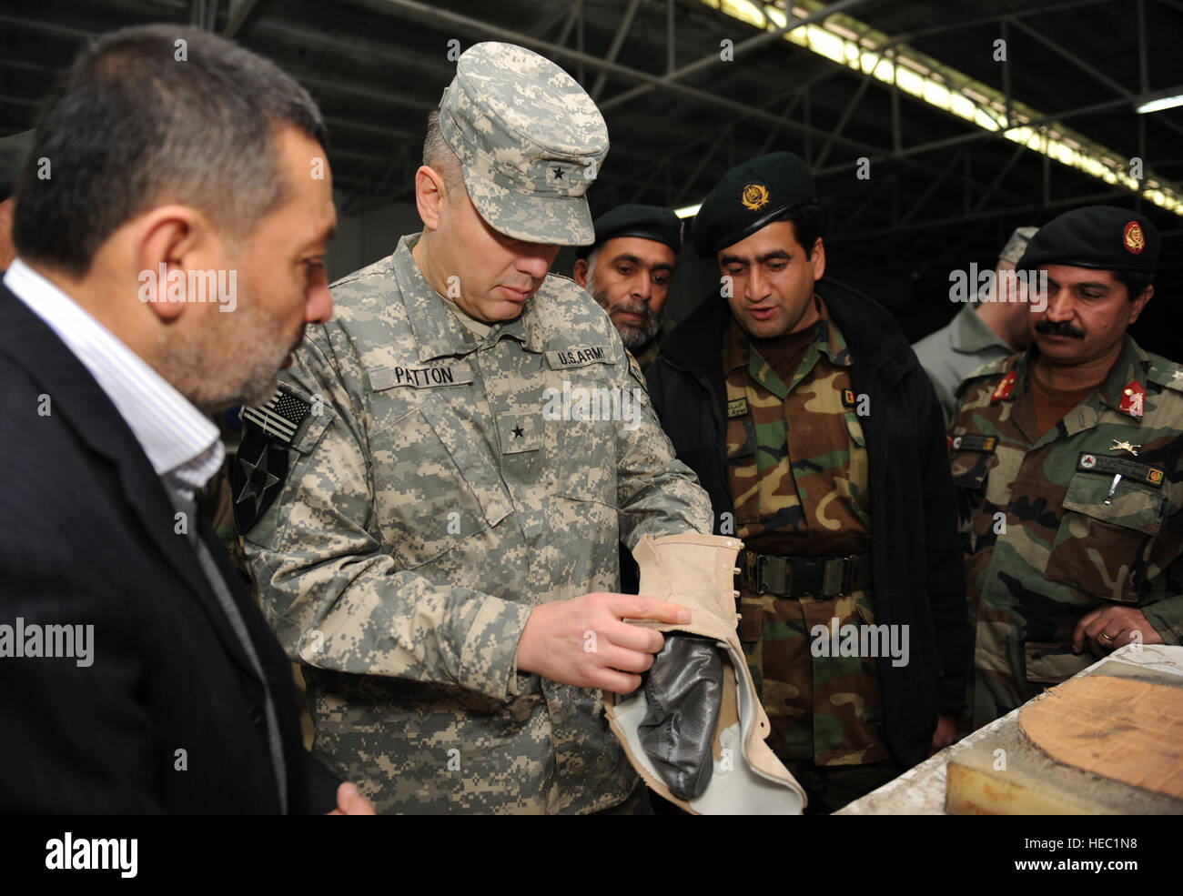 U.S. Army Brig. Gen. Gary Patton, center, Combined Security Transition ...