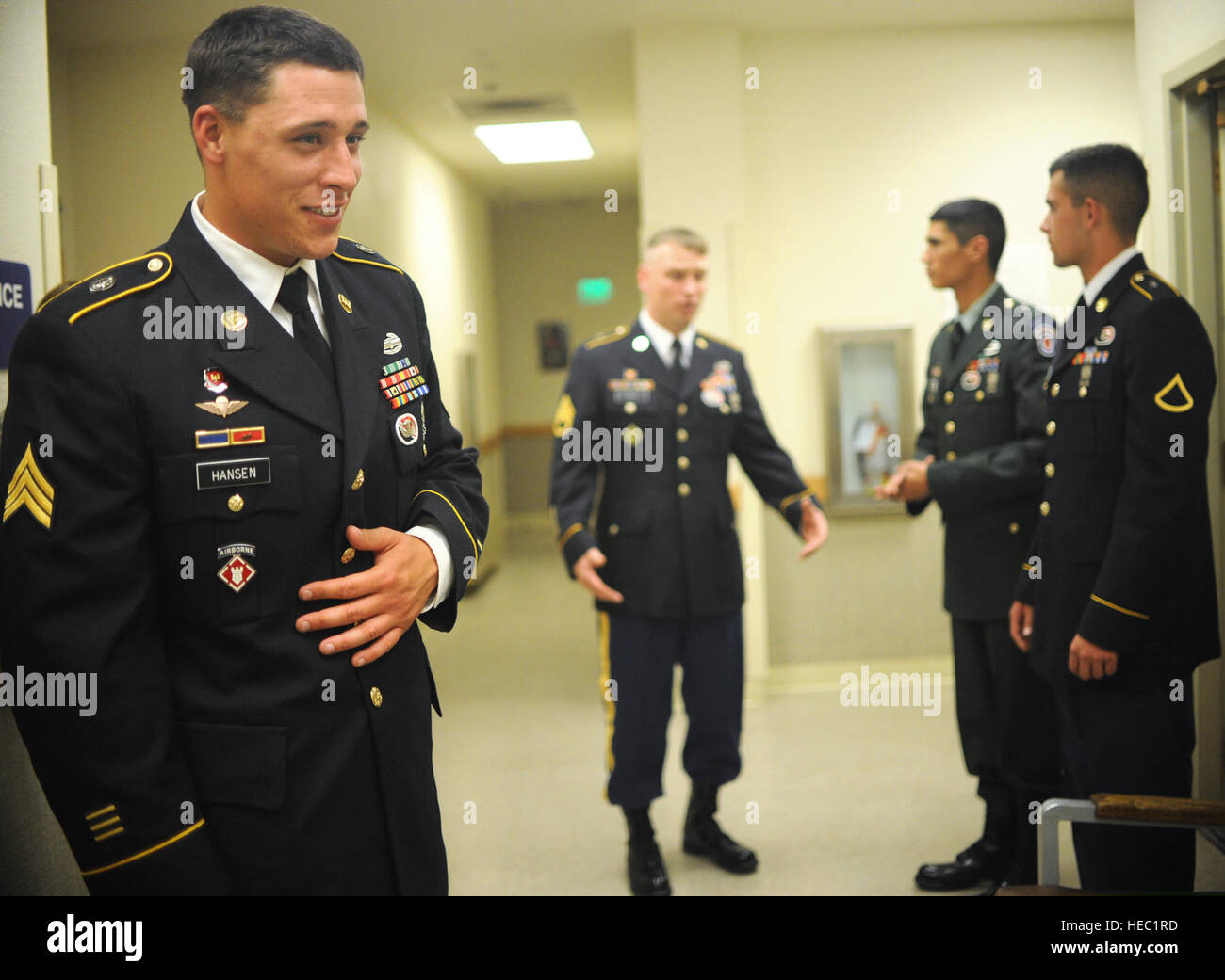 U.S. Army Sgt. Travis Hansen, foreground, assigned to 6th Engineer ...