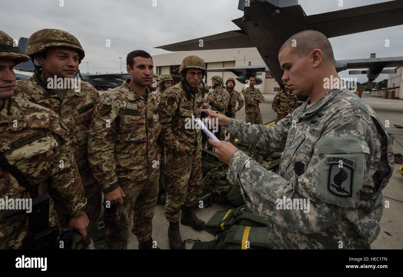 A U.S. Army jumpmaster calls roll for static-line jumpers from NATO and ...