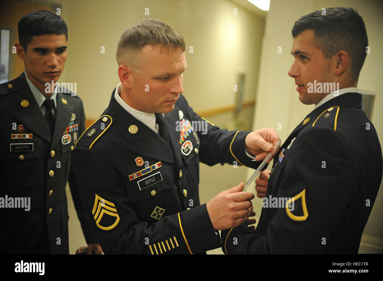 U.S. Army Staff Sgt. Edward Doyle, center, assigned to the 6th Engineer ...