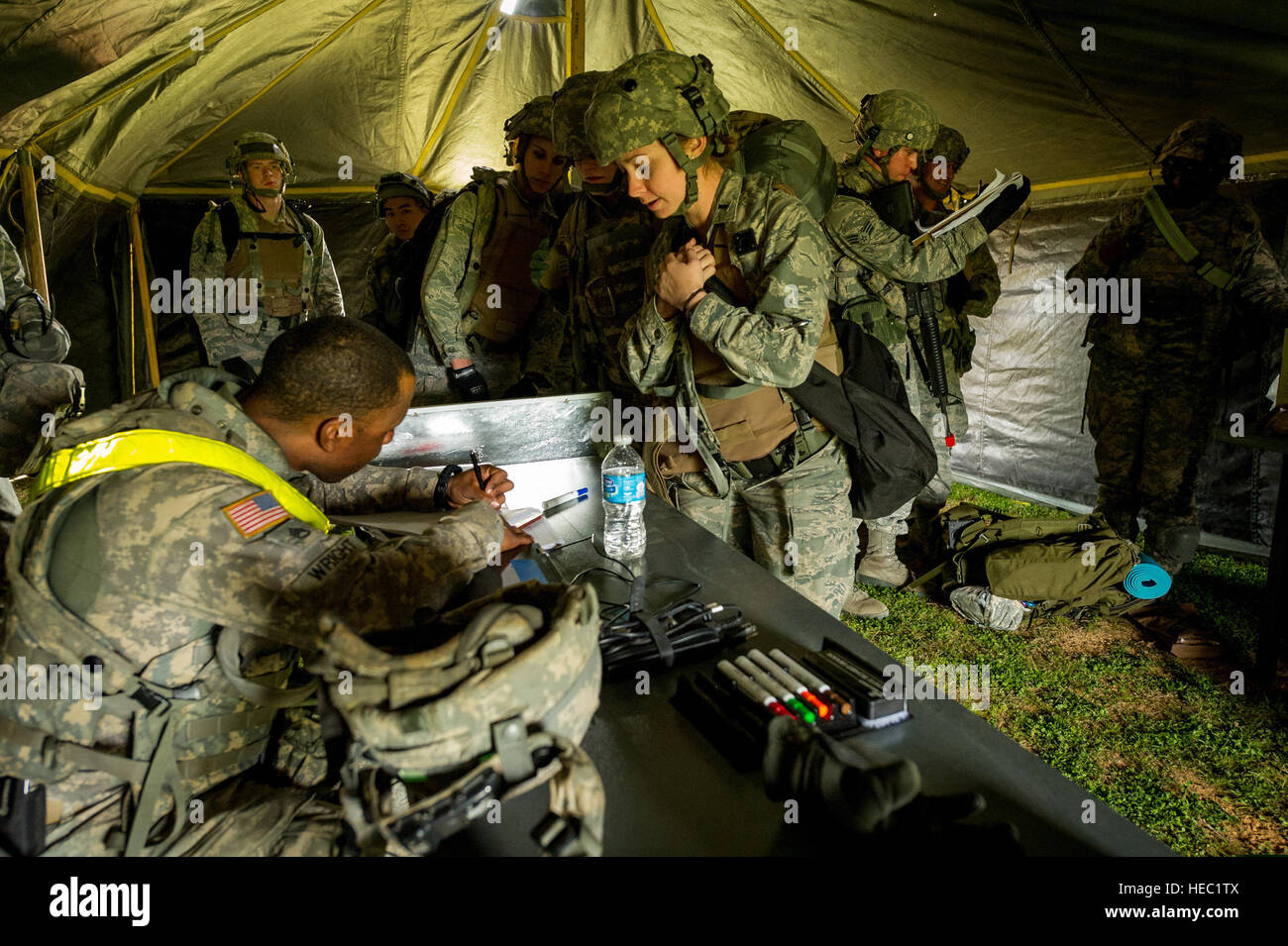 U.S. Army Staff Sgt. Jason Wright, left, a transportation movement ...