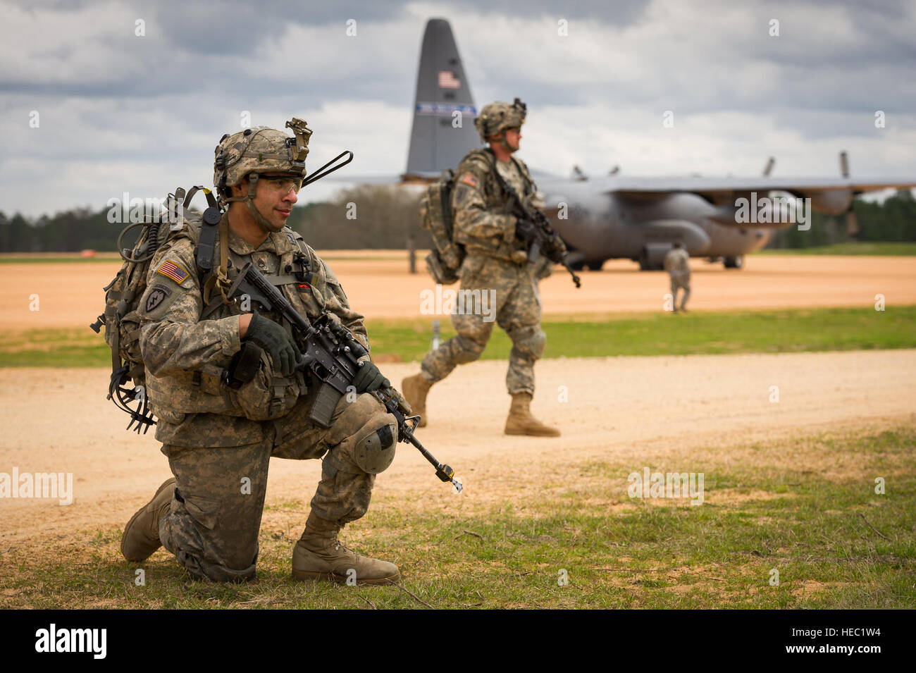 A U.S. Army soldier provides security as evacuees board a Nevada Air ...