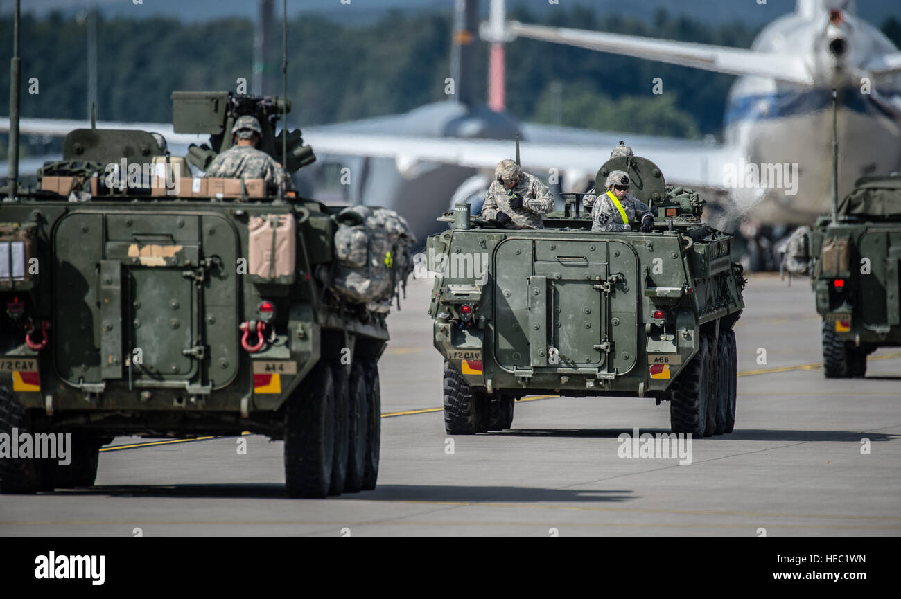 Stryker armored vehicles form a convoy at Ramstein Air Base, Germany ...