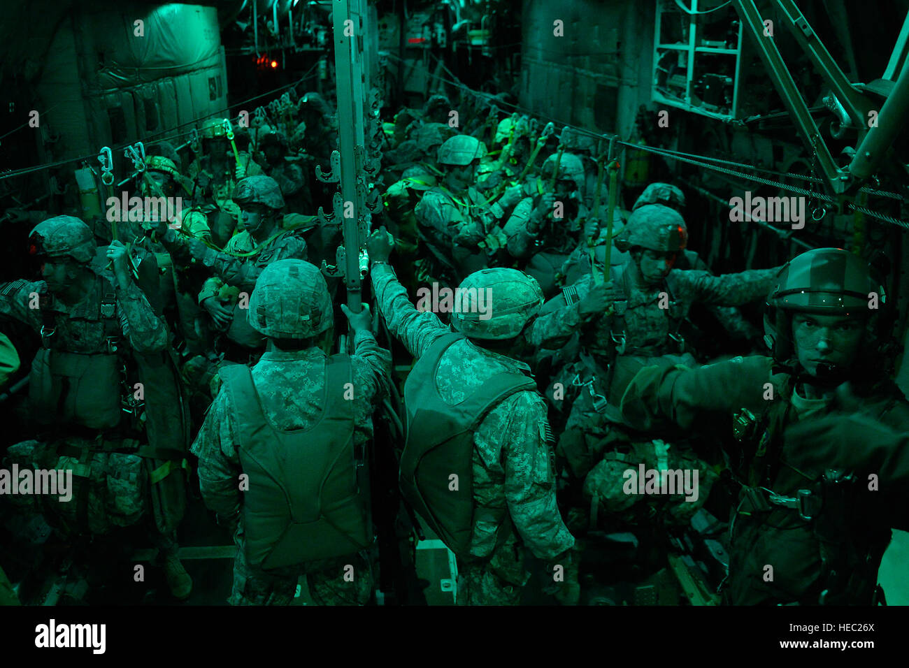 U.S. Soldiers and Canadian paratroopers perform a static line jump from ...