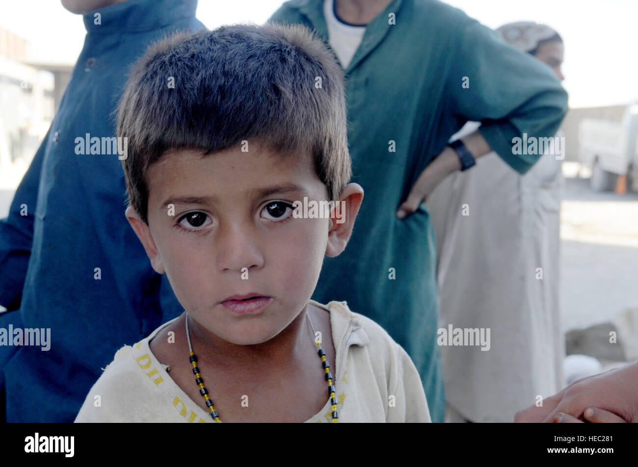 An Afghan boy poses for a photograph in Sharana, Afghanistan, Oct. 1, 2009 Stock Photo - Alamy