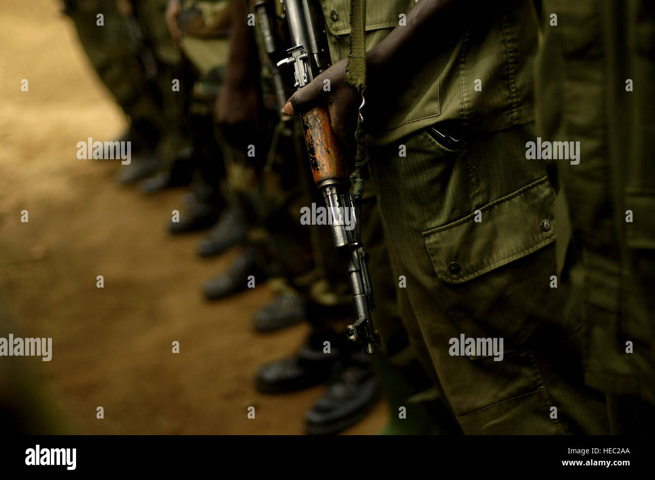 Uganda Army soldiers stand in formation before being released for the ...