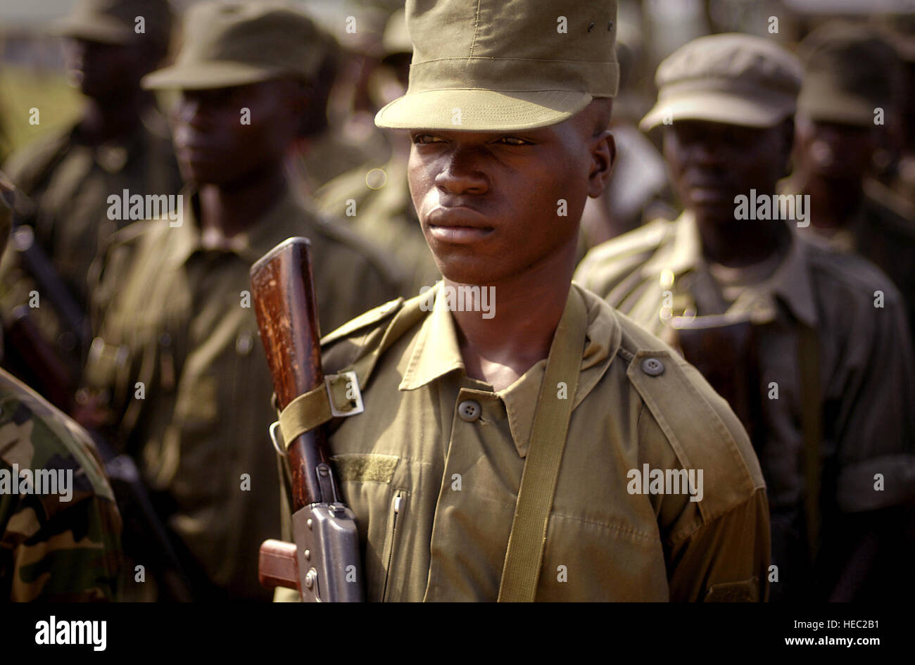 Uganda army soldiers stand in formation before being released for the ...