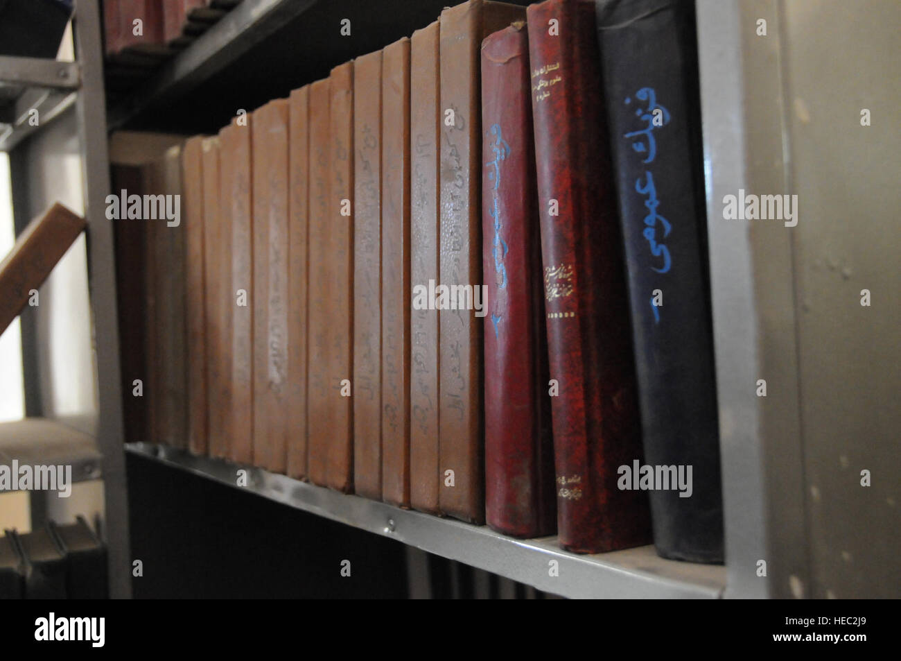 Books line shelves in the University of Ghazni library. The Texas ...