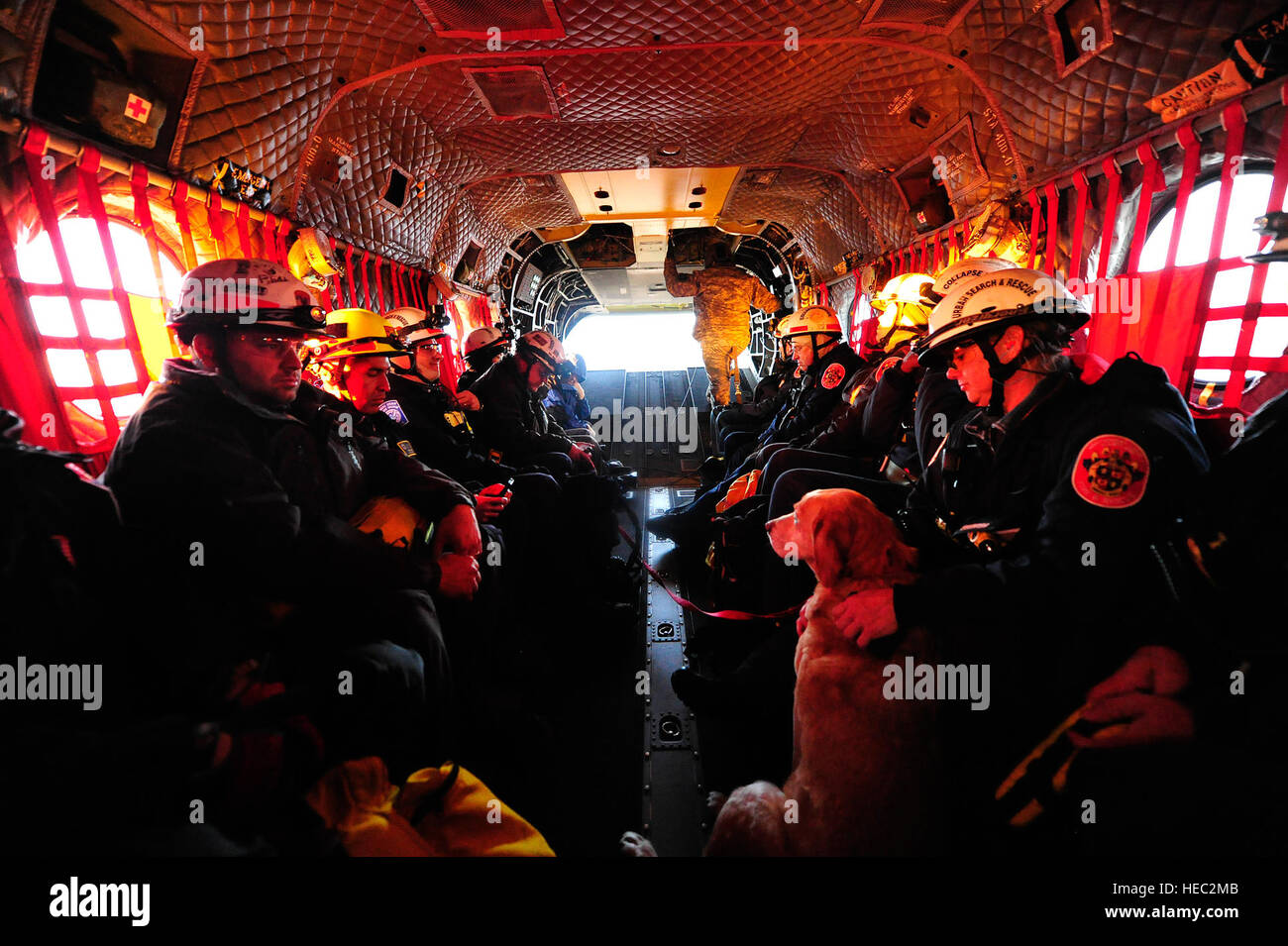 Members of Maryland Urban Search and Rescue Task Force one fly aboard a ...