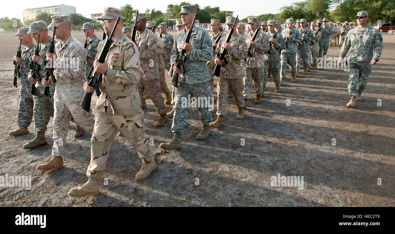 A joint formation of U.S. service members comprised of Marines, Navy ...