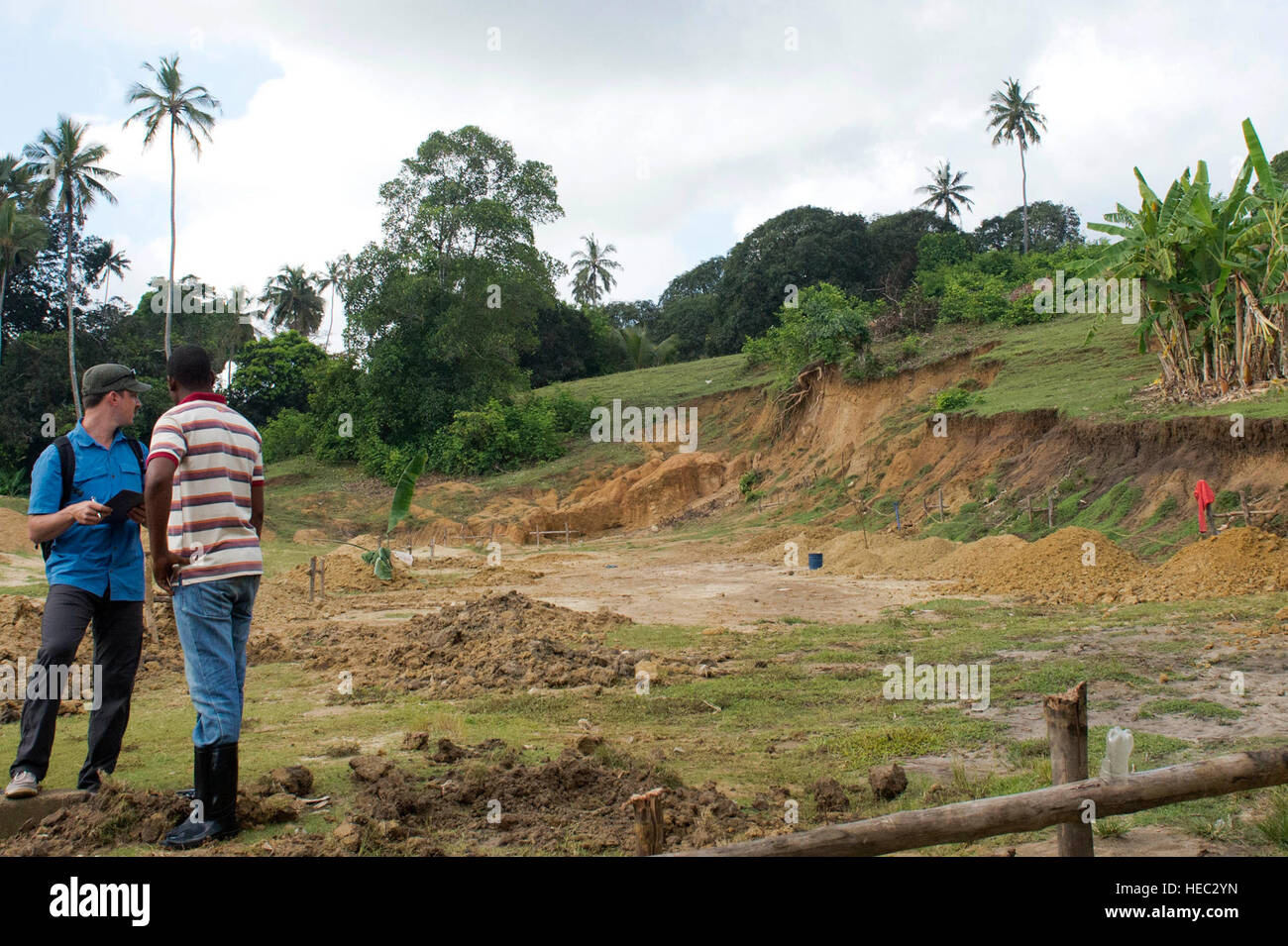 U.S. Navy Lt. Timothy Palik and the Matale Primary School contractor ...