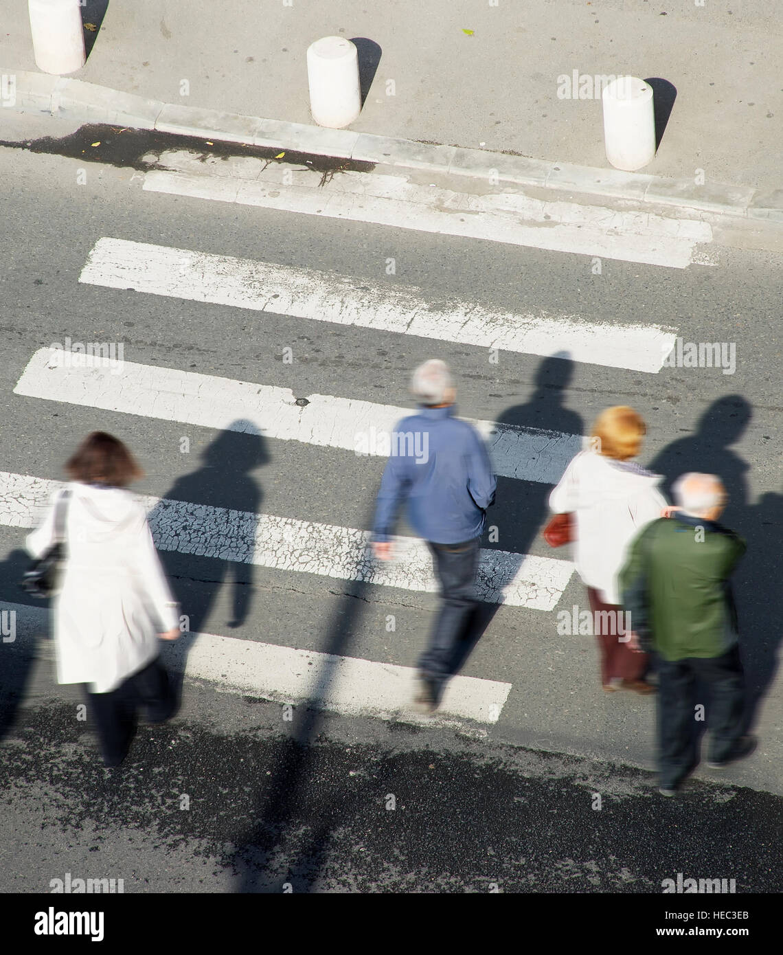 People crossing the street on a zebra Stock Photo - Alamy
