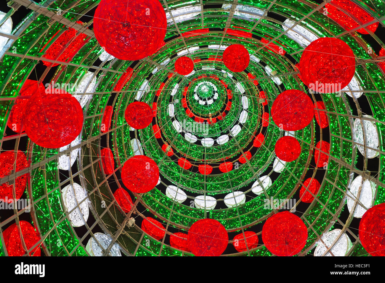 Inside a large illuminated Christmas tree at night Stock Photo - Alamy