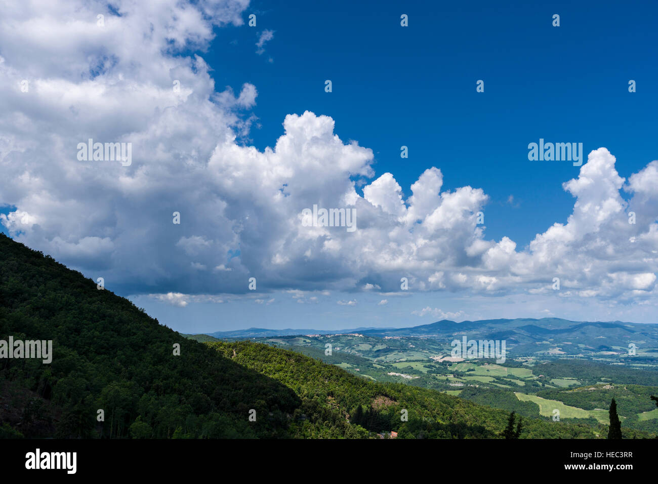 Tuscan blue sky with clouds hi-res stock photography and images - Alamy