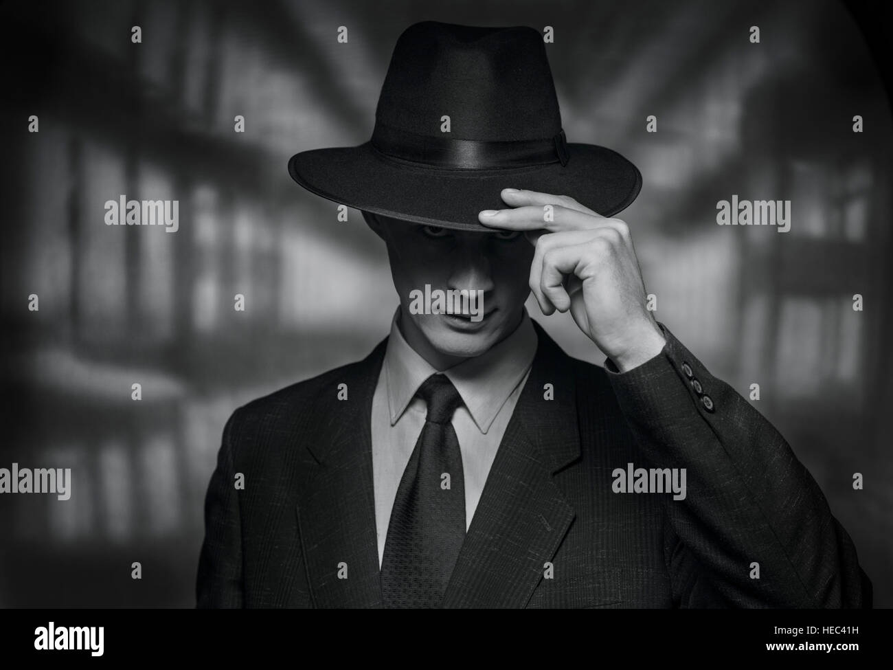 The detective takes on the camera. Vintage style black and white image ...