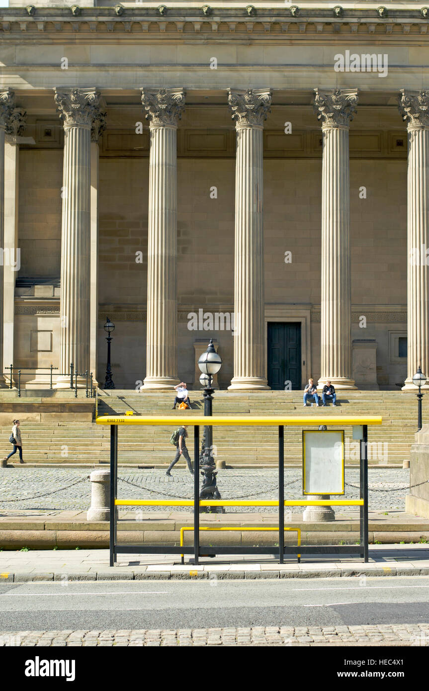 Yellow bus stop in front of King Georges Hall Liverpool Stock Photo - Alamy