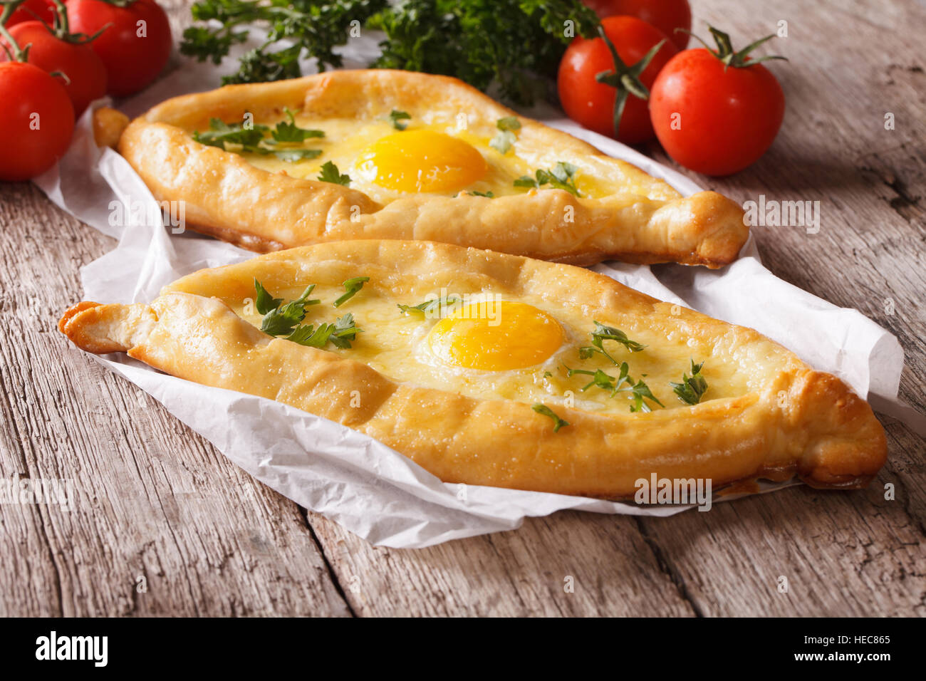Khachapuri bread on board cheese hi-res stock photography and images ...