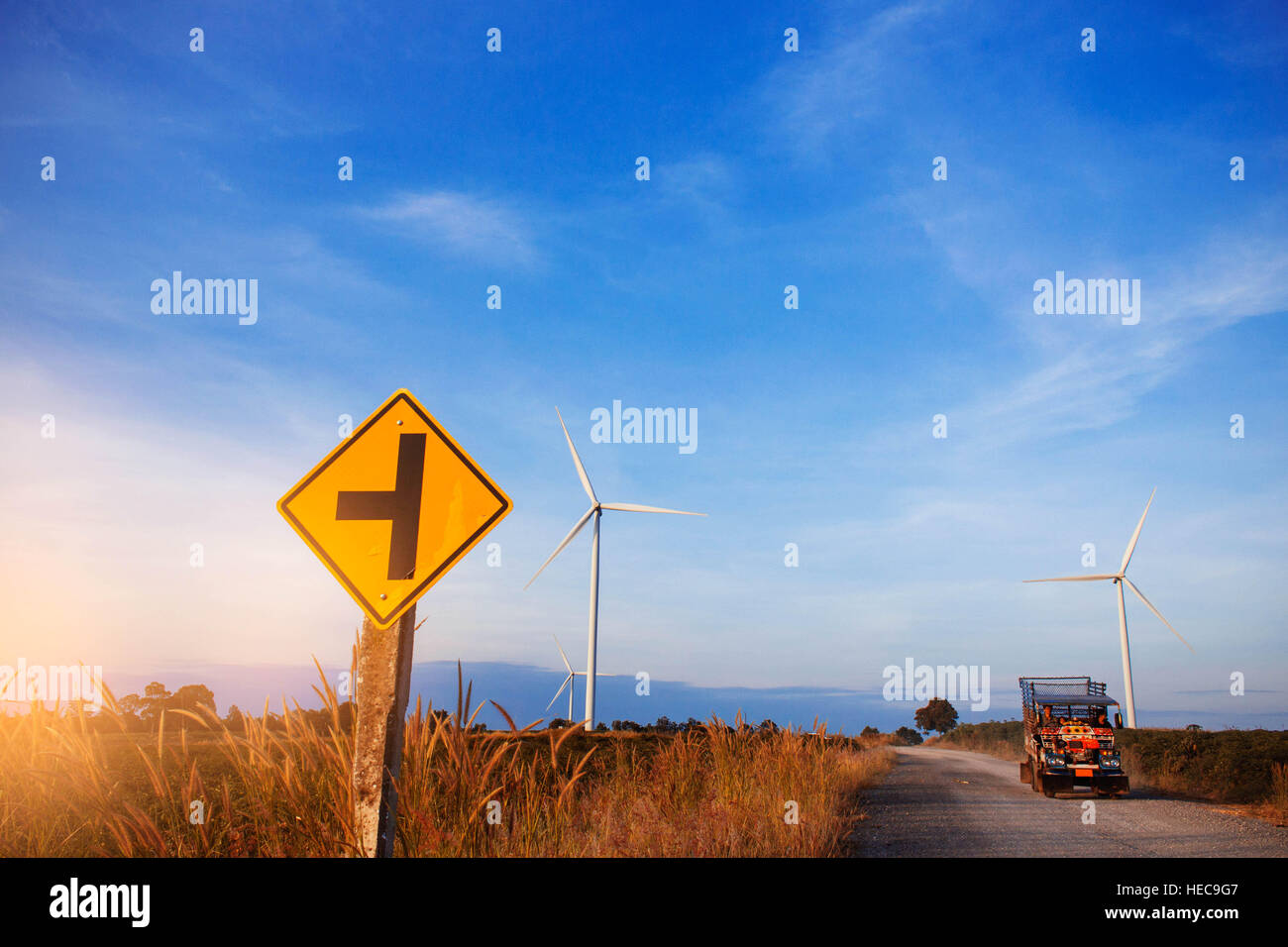 Traffic sign on a country road with blue sky Stock Photo - Alamy