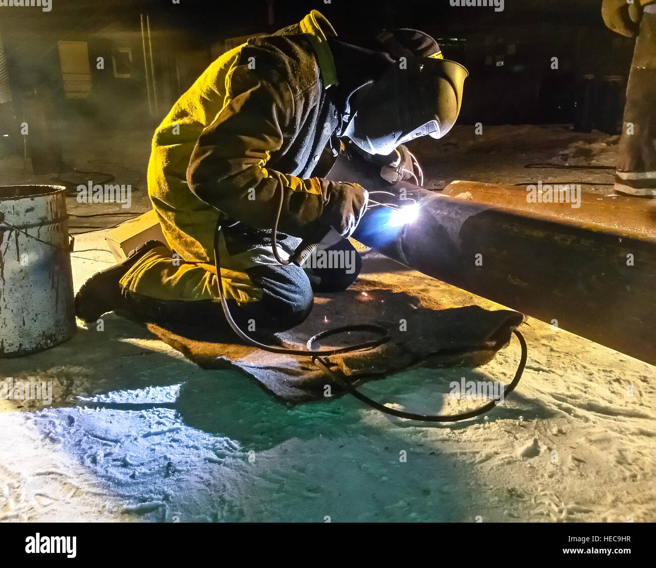 Safety at work. Welding and grinding of iron constructions. Industrial ...