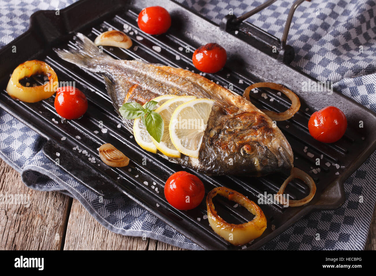 Preparation fish on grill hi-res stock photography and images - Alamy