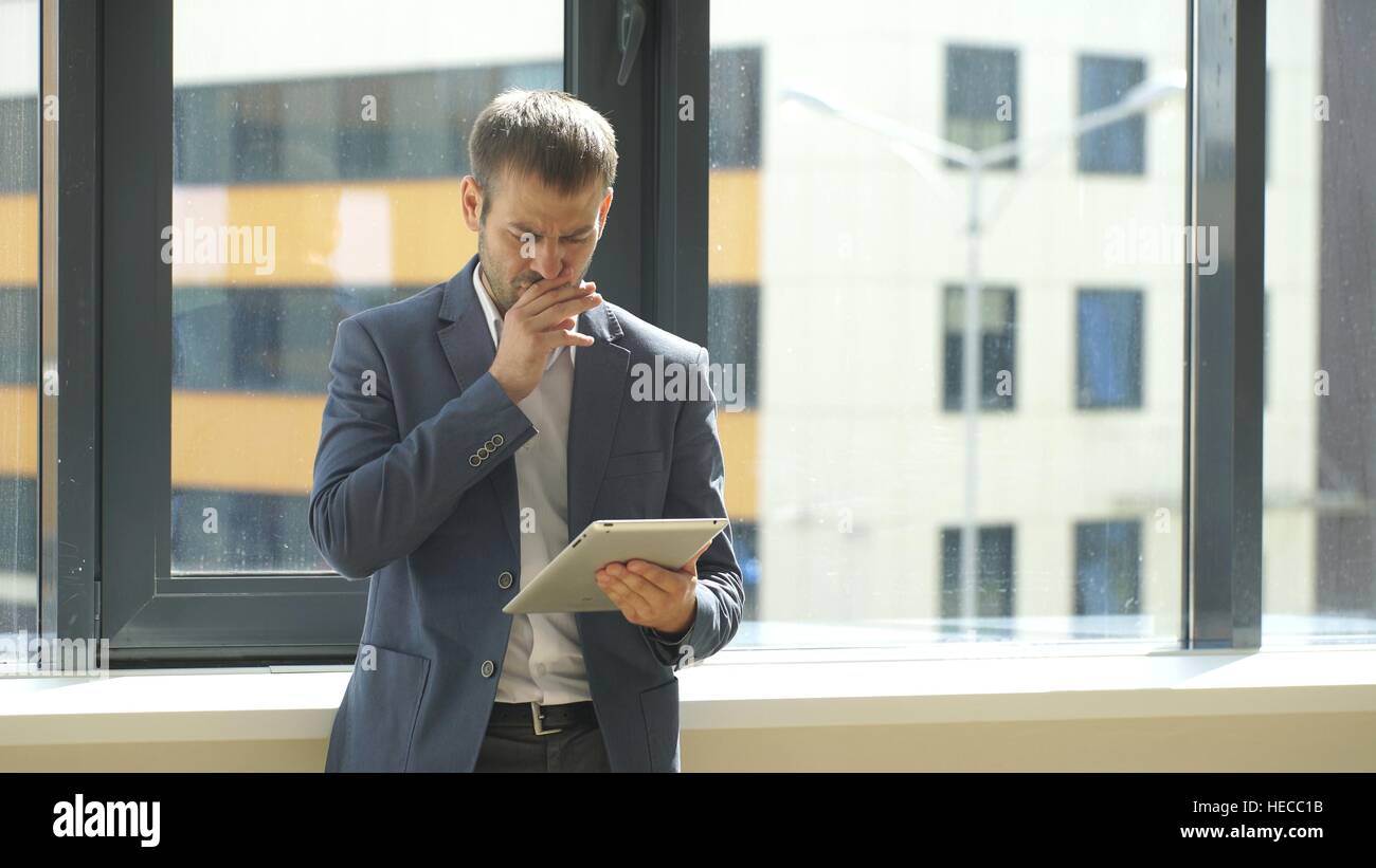 Using laptop near windows hi-res stock photography and images - Alamy