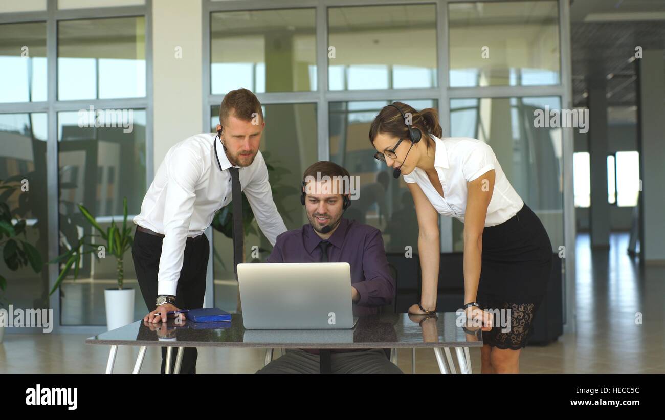 Office workers using computers in an office Stock Photo - Alamy