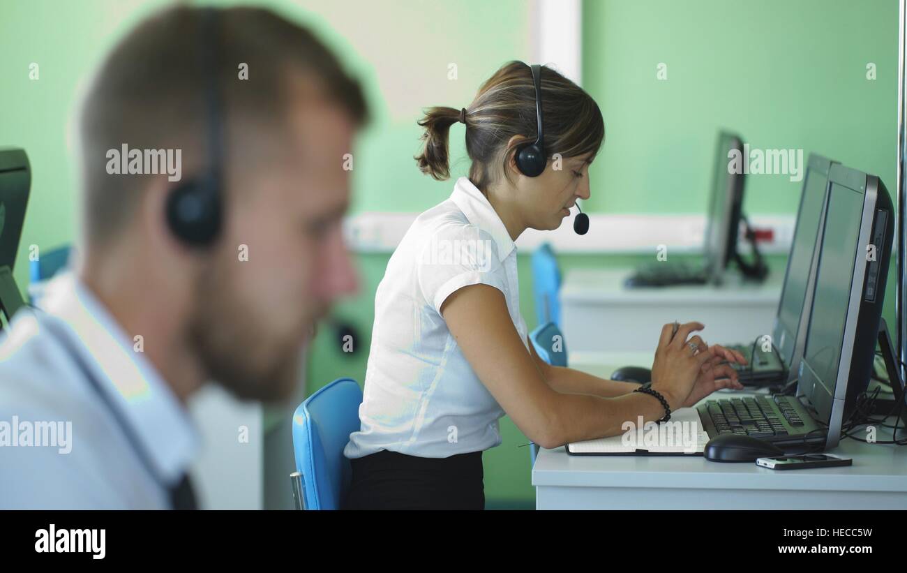 Positive girl working in call hi-res stock photography and images - Alamy