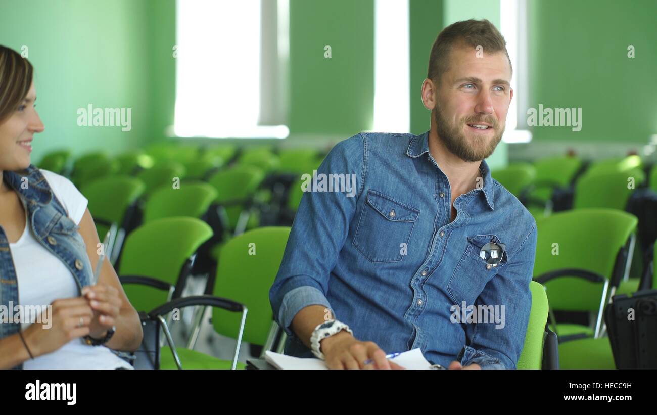 group of students sitting at the lecture in the classroom Stock Photo ...