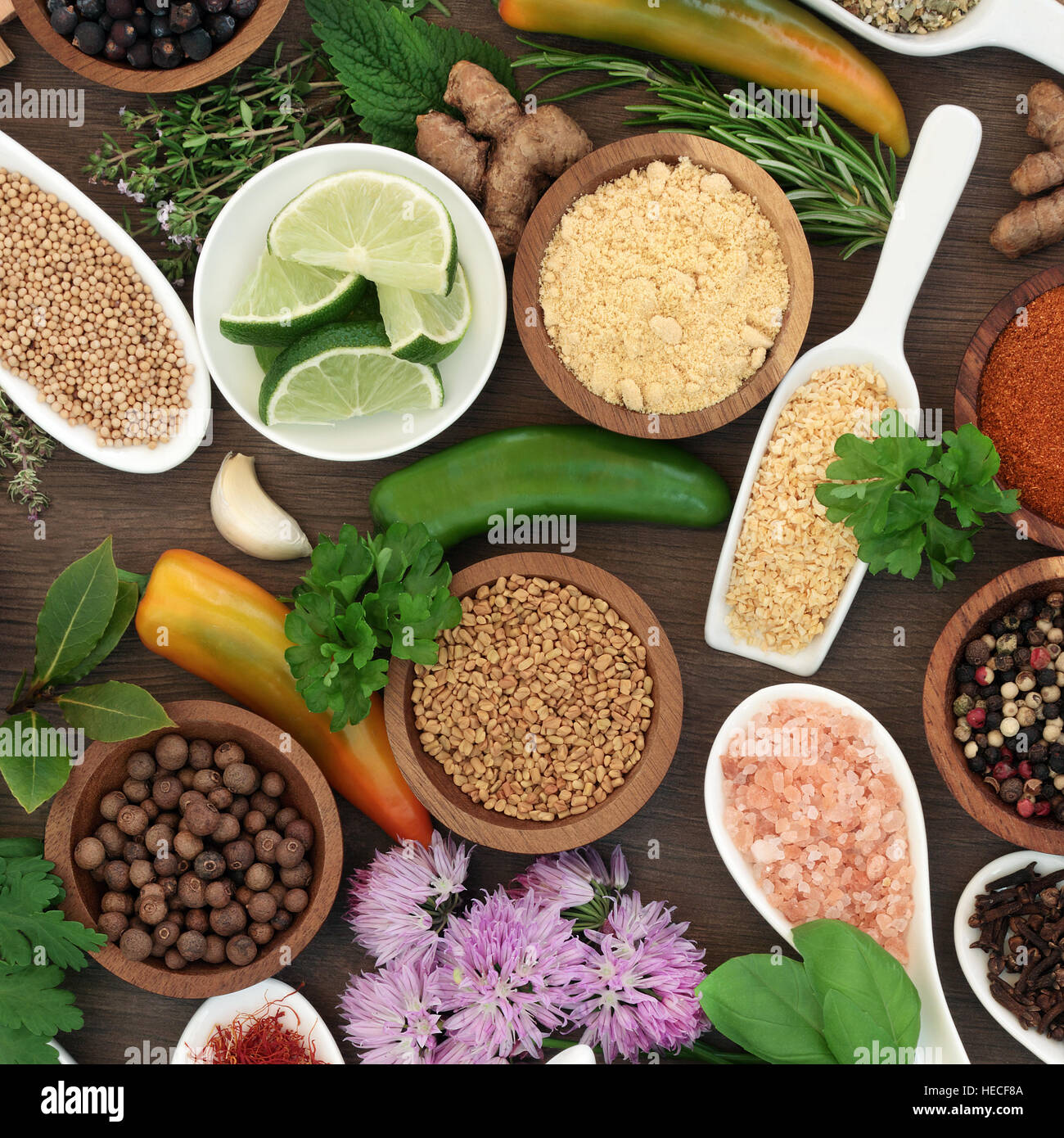 Culinary herb and spice selection on oak background Stock Photo - Alamy