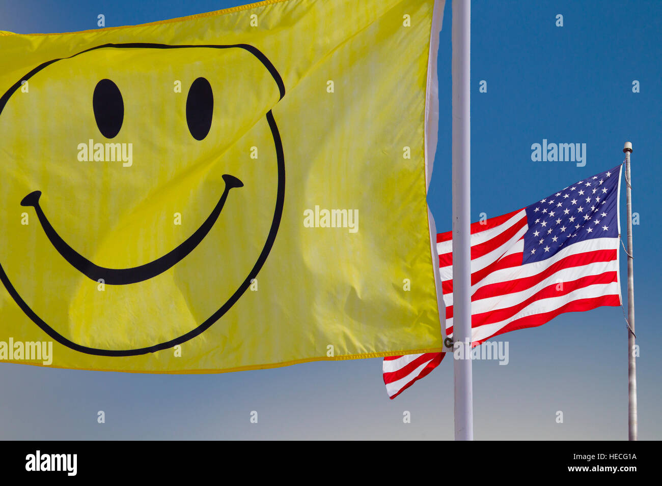Smiley faced flag and flag of the United States of America Stock Photo ...