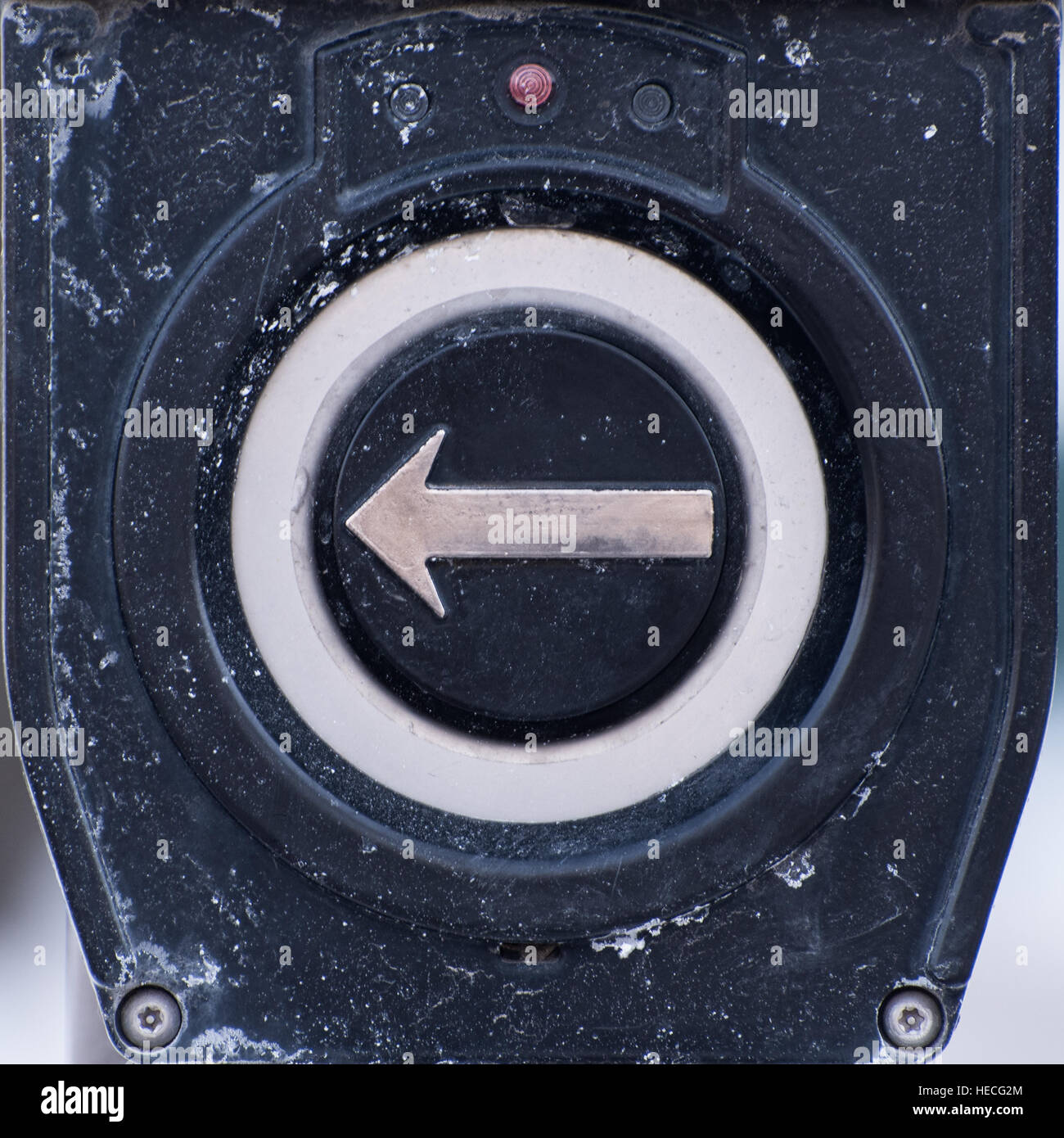 Arrow button on a pole Stock Photo - Alamy