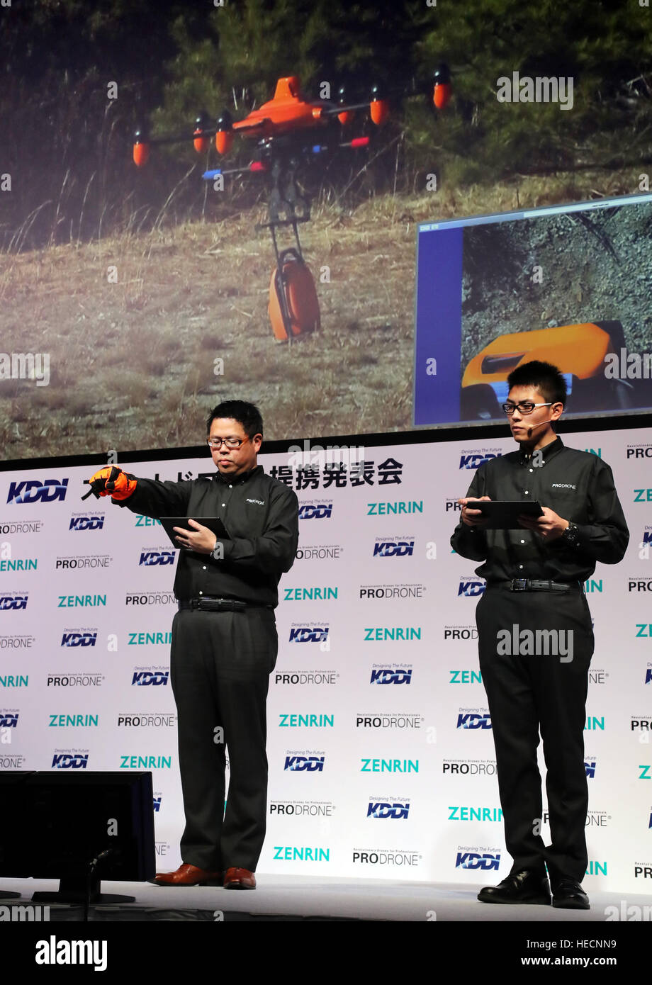 Tokyo, Japan. 19th Dec, 2016. Japanese business drone company employees ...