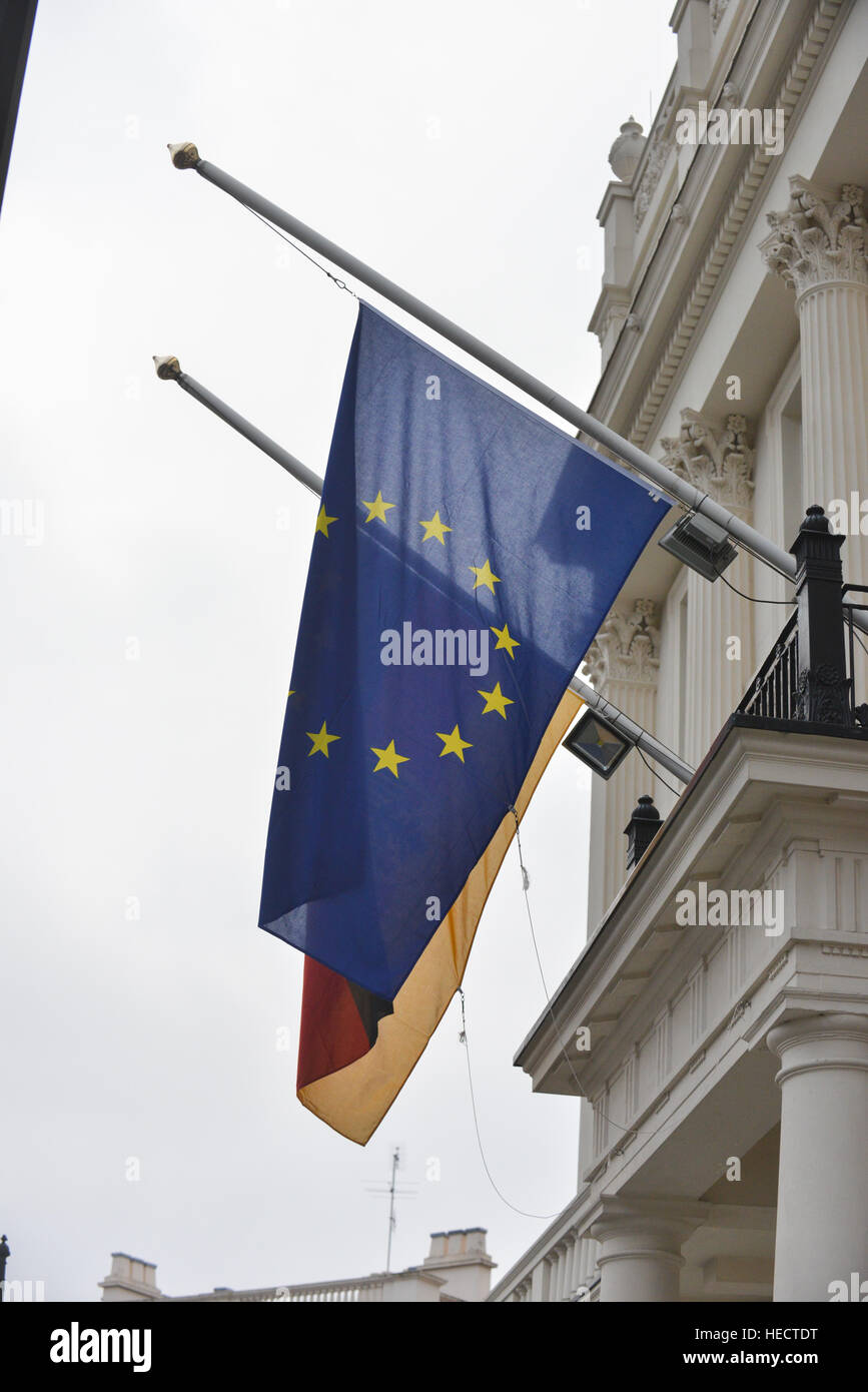 London, UK. 20th Dec, 2016. Flags fly at half mast at the German and ...