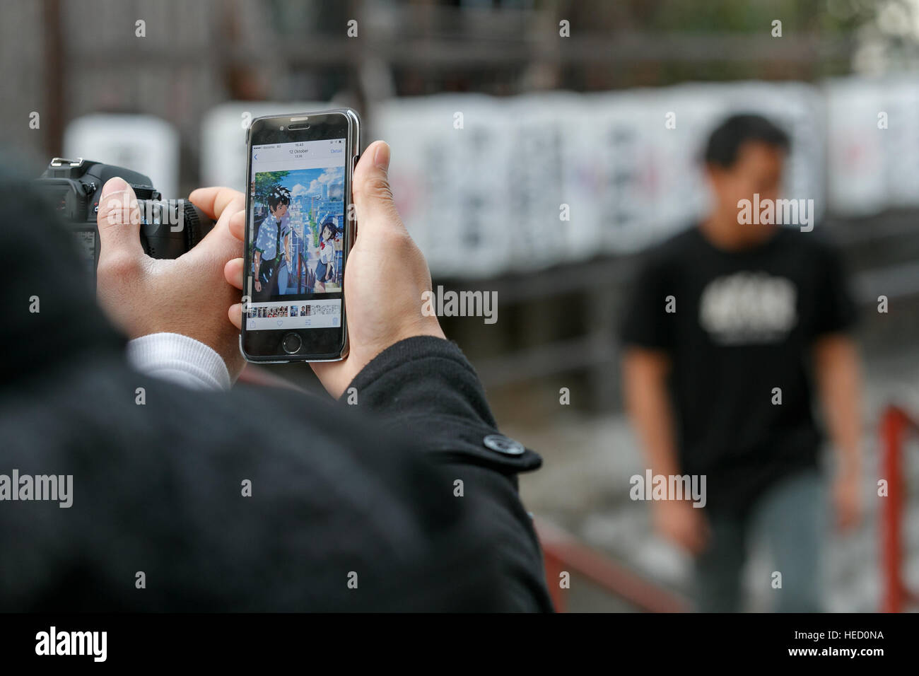 A foreign visitor from Indonesia poses for a picture at the stairway ...