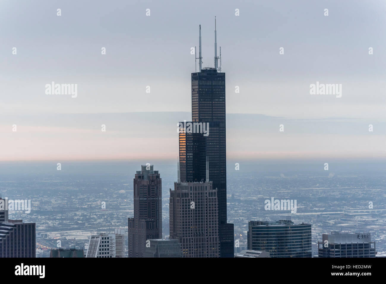 Chicago, USA. 21 December 2016. Weather. Light from the sunrise on the ...