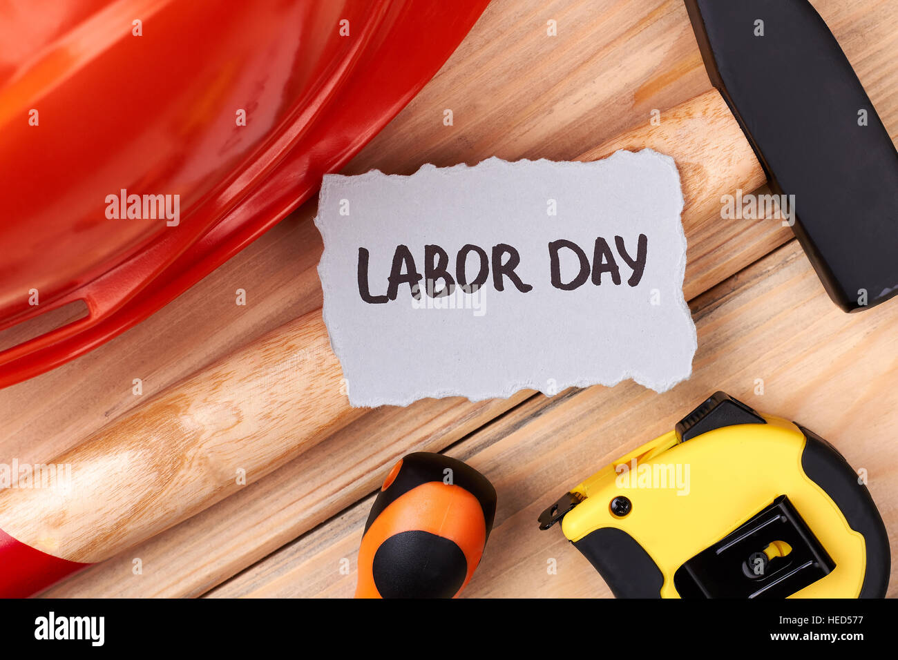 Labour Day paper and tools Stock Photo - Alamy
